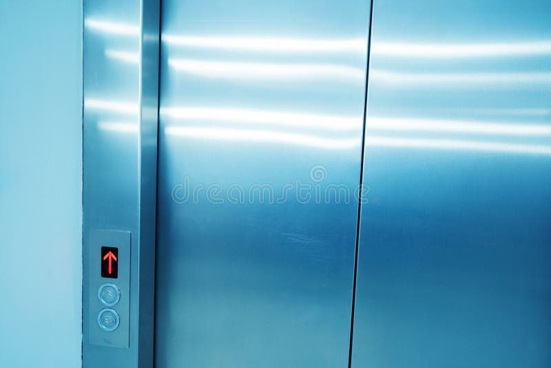 Elevator Door in Stainless Steel. Up Arrow Stock Photo - Image of lobby ...