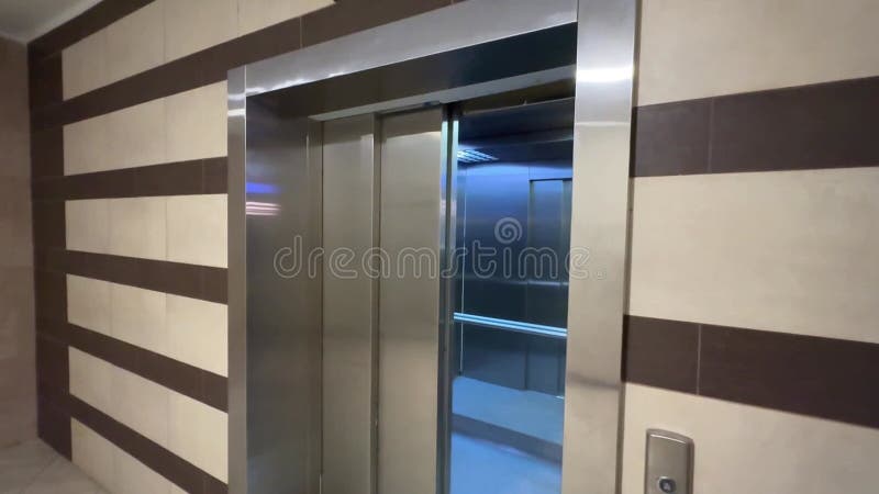 The Elevator Doors Open. the Metal Doors Open and Close Smoothly Stock ...