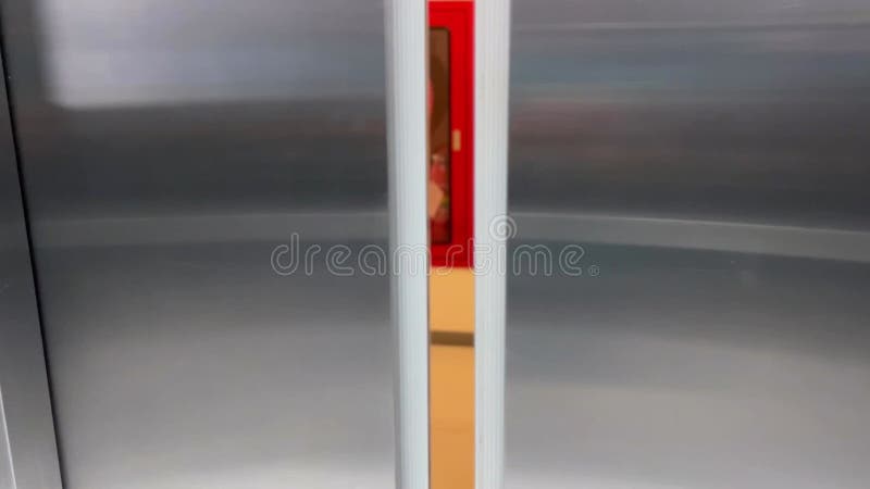 The Elevator Doors Open. Opening the Door is an Elevator Stock Footage ...