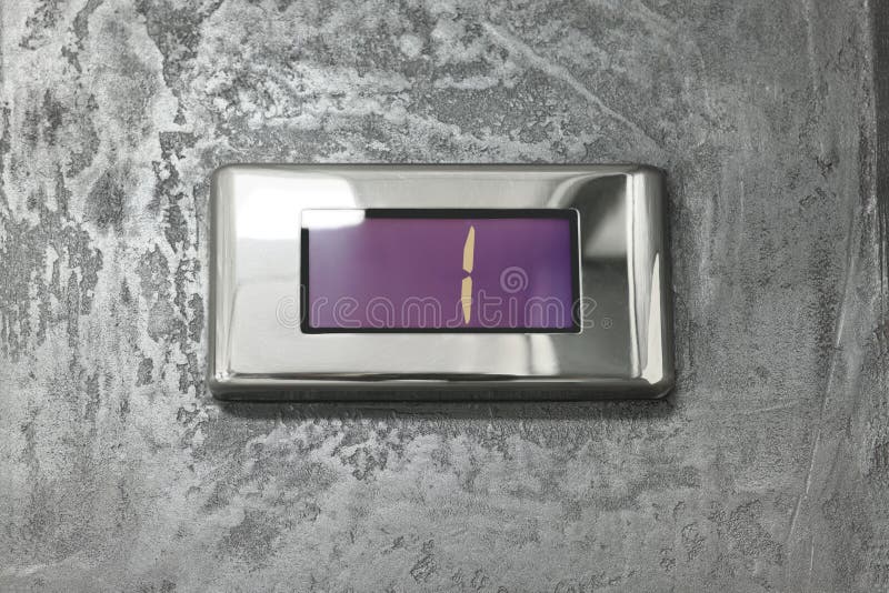 Elevator Floor Indicator with Number One on Grey Textured Wall, Closeup ...