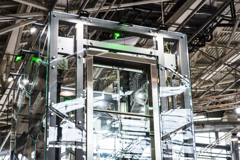 Elevator Installation, Lift Technician Installing a Modern Elevator ...