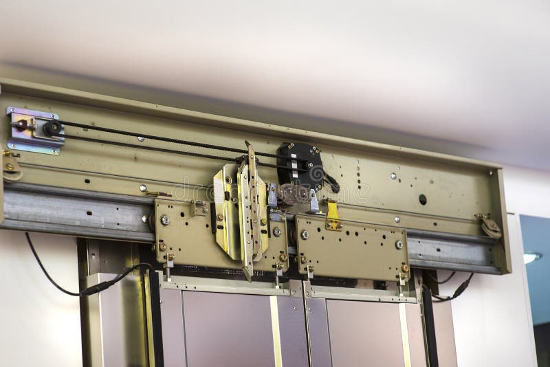 Elevator Installation, Lift Technician Installing a Modern Elevator ...