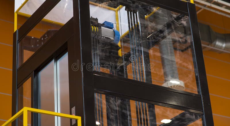 Elevator Installation, Lift Technician Installing a Modern Elevator ...
