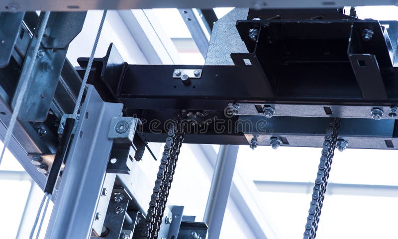 Elevator Installation, Lift Technician Installing a Modern Elevator ...