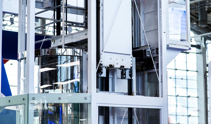 Elevator Installation, Lift Technician Installing a Modern Elevator ...