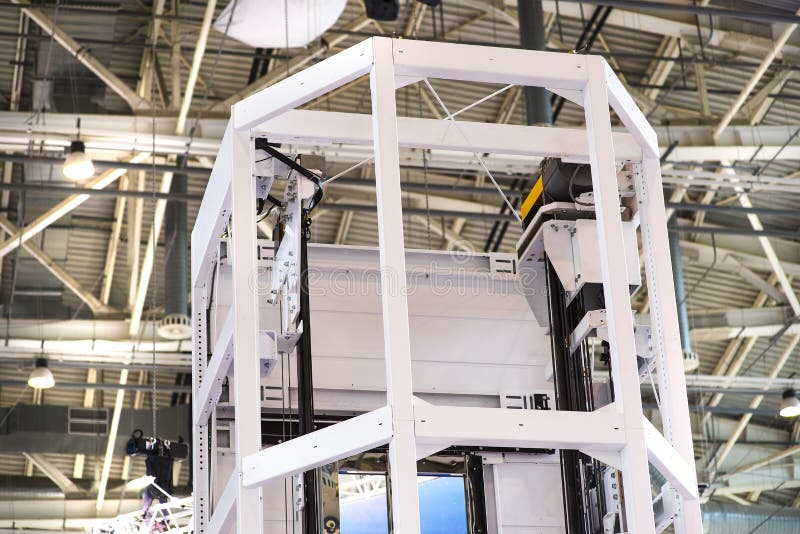 Elevator Installation, Lift Technician Installing a Modern Elevator ...