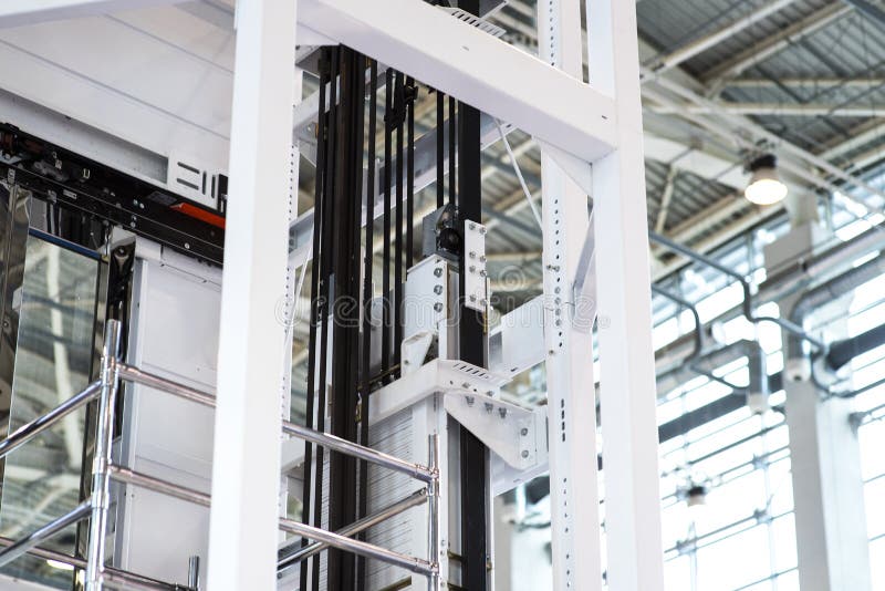Elevator Installation, Lift Technician Installing a Modern Elevator ...