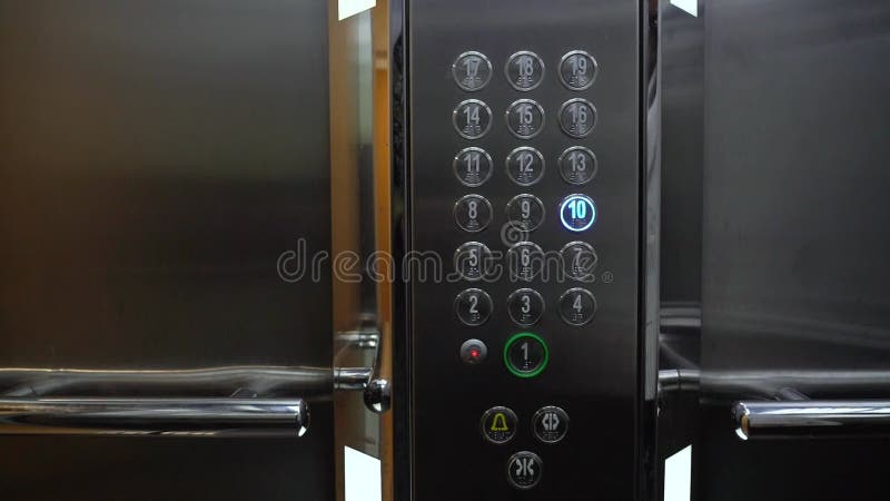 Elevator. People Go Up in the Elevator and Press the Button Stock ...