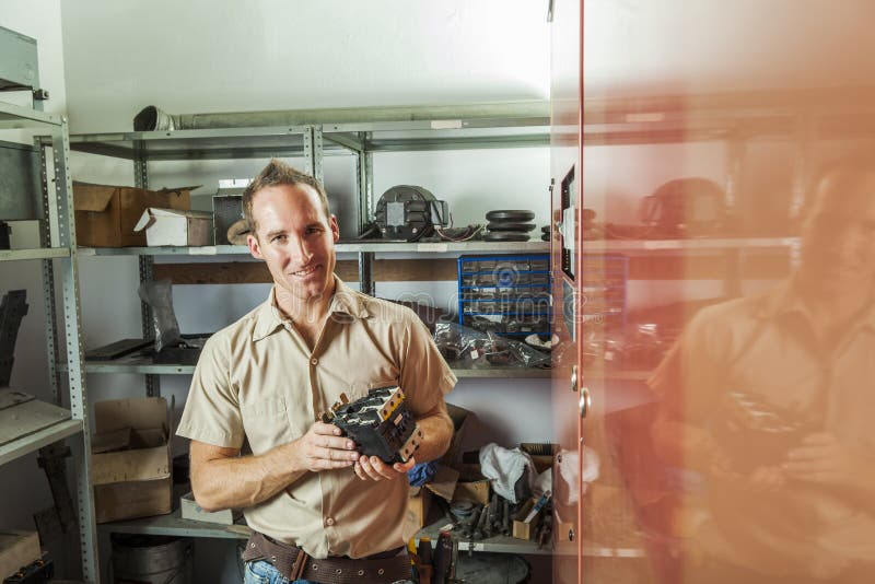 Elevator Repair Man at Work Stock Photo - Image of adjusting, inspector ...