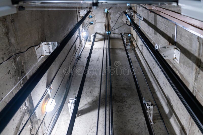 Elevator Shaft Featuring Cables and Bright Lights for Enhanced ...