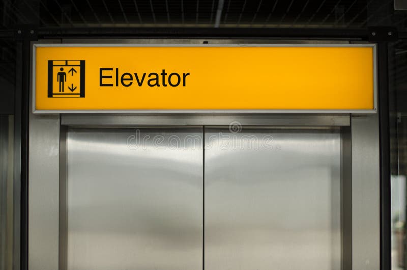 Elevator sign stock image. Image of style, silver, brushed - 32744737