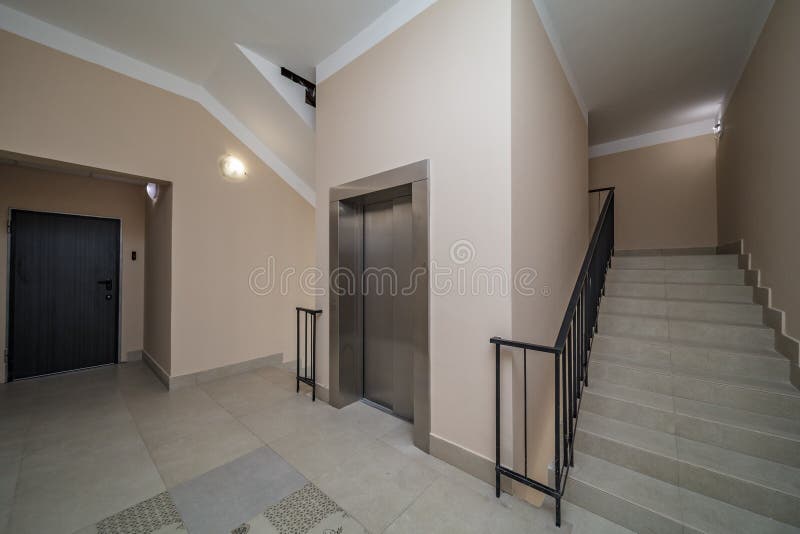 Elevator and stairs stock photo. Image of doorway, metallic - 118763996