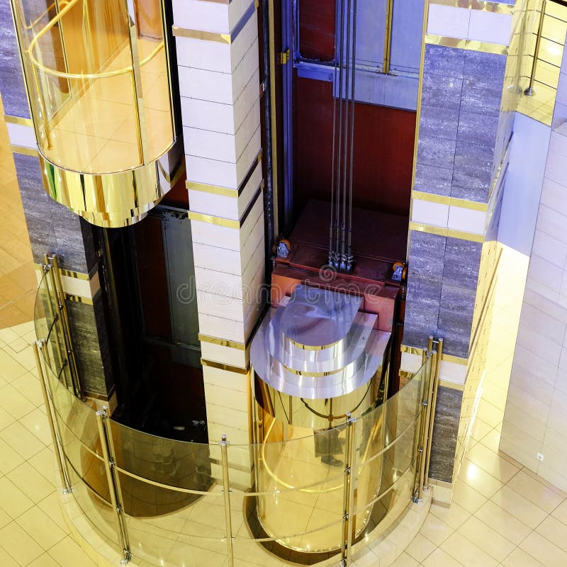 The Elevator Corridor In The Building Is Illuminated With White Light ...