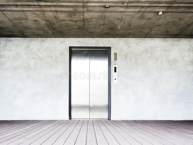 Elevator on Wooden Floor and Concrete Wall Stock Image - Image of ...