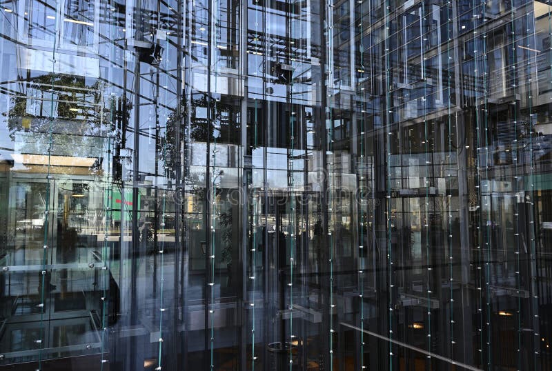 Elevators Behind a Glass Wall in an Office Building Stock Image - Image ...