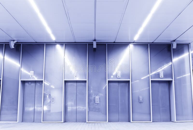 Elevators in blue stock image. Image of door, elevator - 7674635