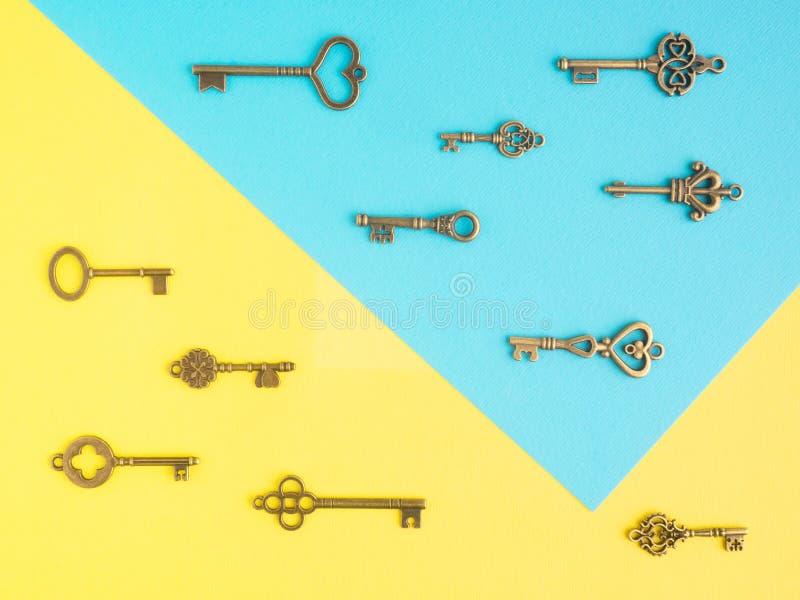 Eleven Bronze Antique Key on Blue and Yellow Background Stock Image ...