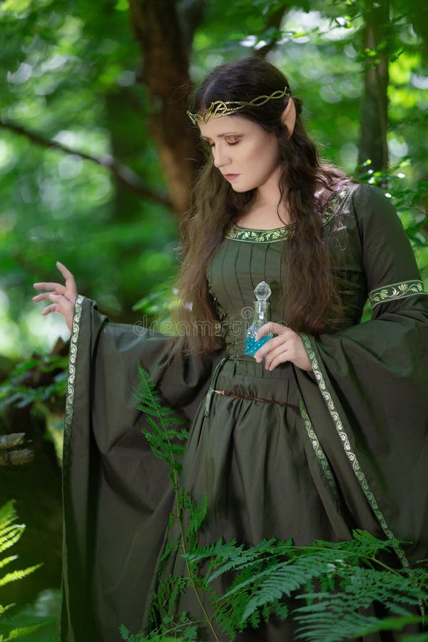 Elf with a Bottle of Magic Potion Stock Image - Image of archeress ...
