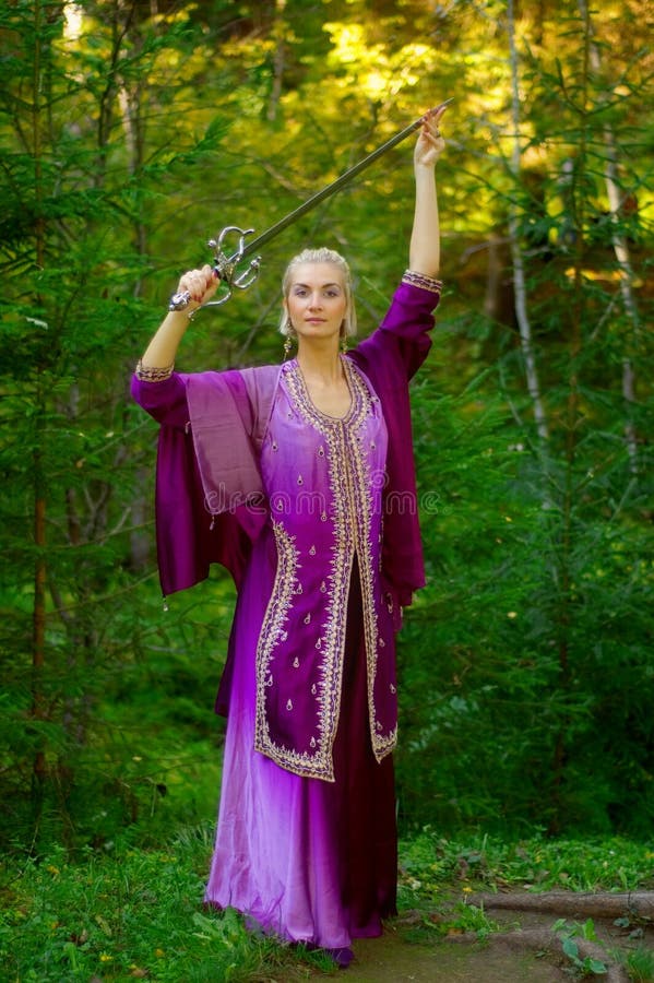 Elf girl with a sword stock image. Image of costume, hair - 1486097