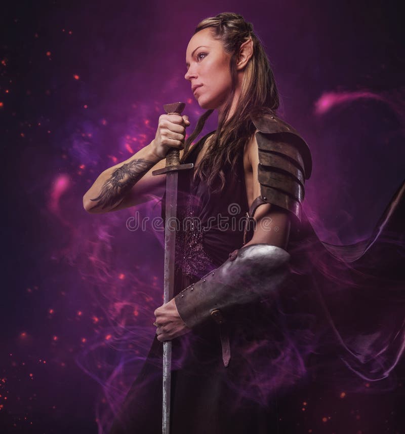 Elf woman holding sword stock image. Image of armor - 112964509
