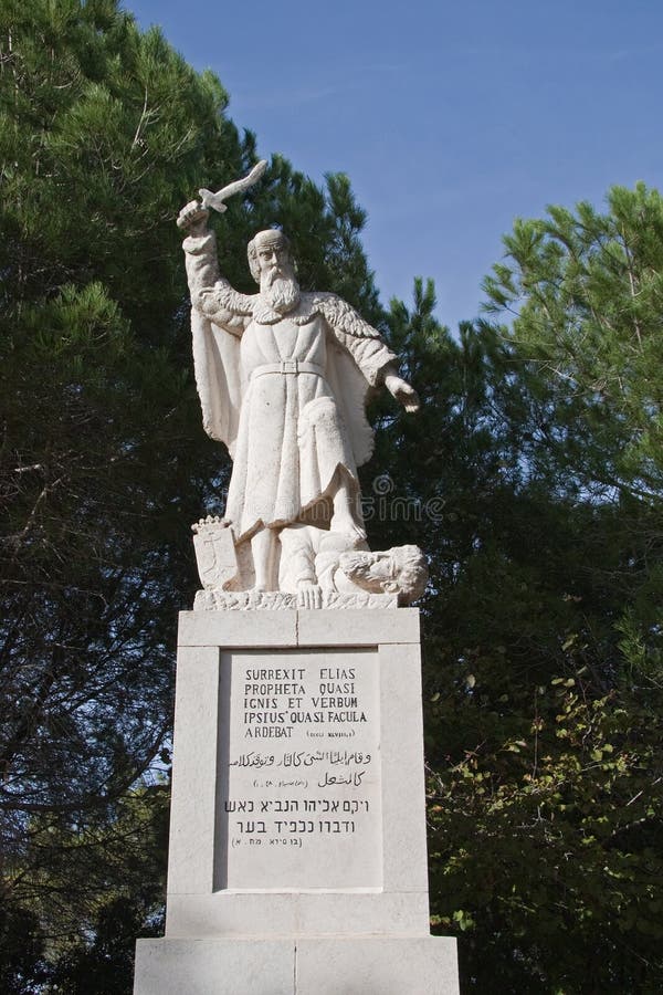 A Statue Of St Elijah The Prophet Holding A Knife On A Blue Sky Stock ...