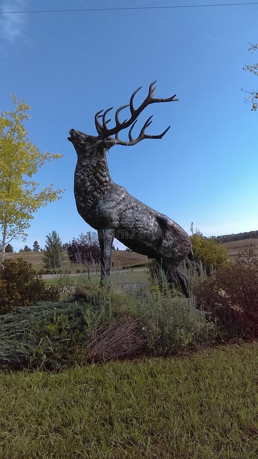 Elk climbing stock photo. Image of statue, green, mammal - 102958046