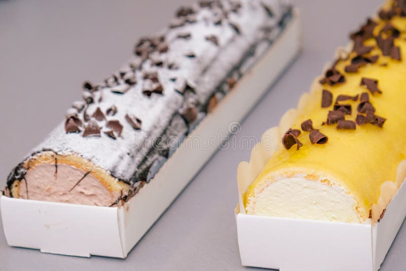 Elongated Cakes of Different Flavors with Chocolate Chips on Top Stock ...