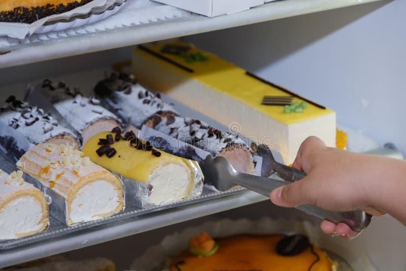Elongated Cakes Inside a Fridge in a Pastry Shop Stock Image - Image of ...