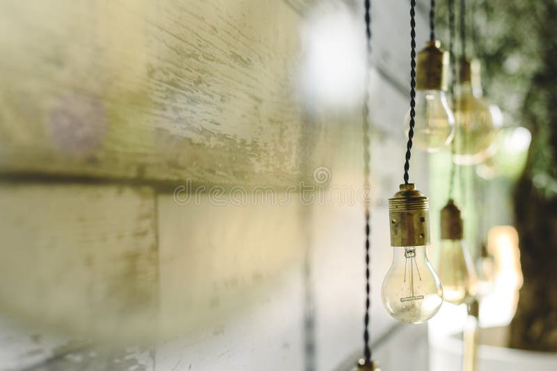 Elongated Decoration Bulbs Hanging from the Wooden Ceiling Stock Photo ...