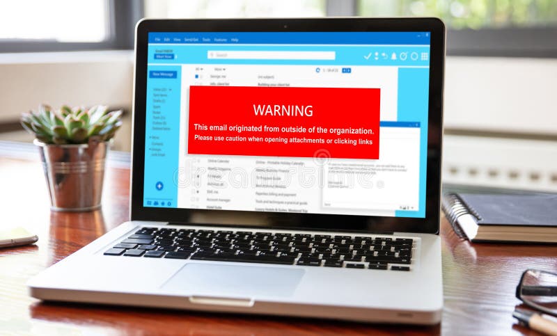 Email Attachments Warning Message on a Laptop Screen. Computer Virus ... Email Attachments Warning Message on a Laptop Screen. Computer Virus ...