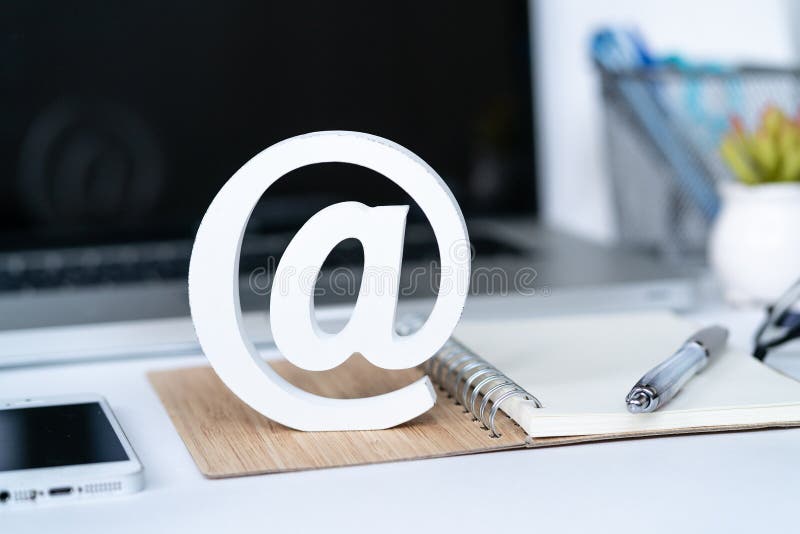 Email Comcept. Contact Us for Feedback. Desktop with Notepad ...