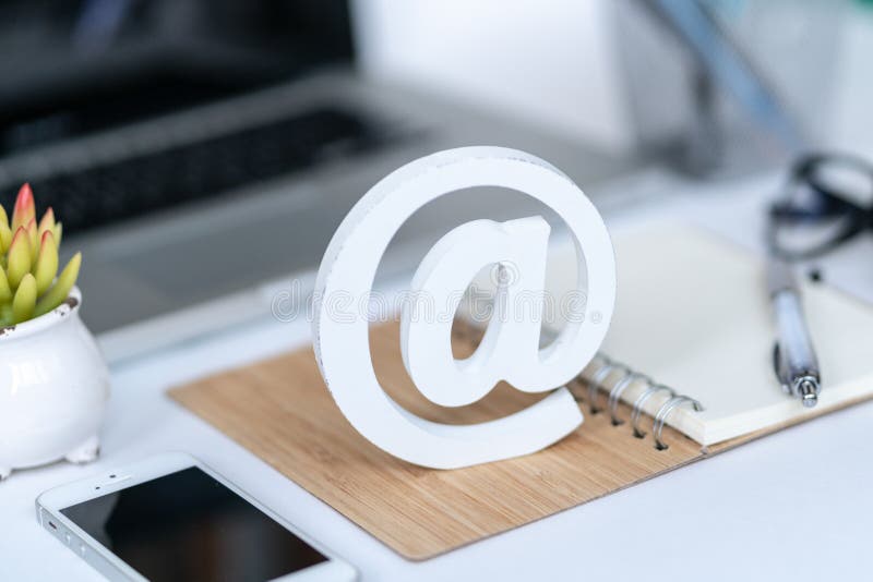 Email Comcept. Contact Us for Feedback. Desktop with Notepad ...