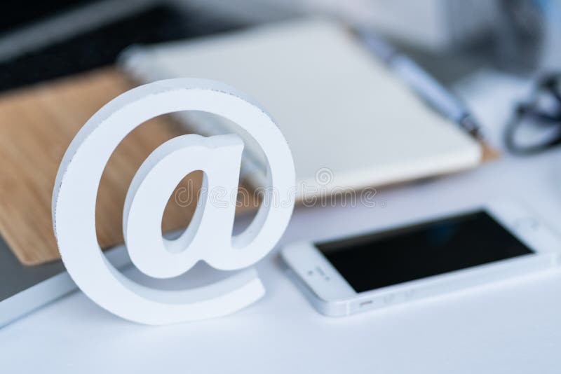 Email Comcept. Contact Us for Feedback. Desktop with Notepad ...