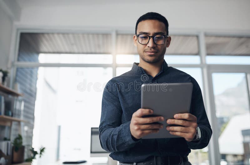 Email, Reading and a Businessman with a Tablet at Work for Connectivity ...