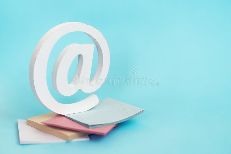 Email Sign on a Stack of Stickers on Blue Background Concept for Email ...