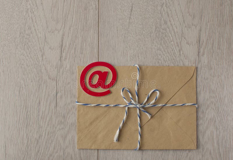 Email Simbol at Sign on Brown Envelopes Background Stock Image - Image ...