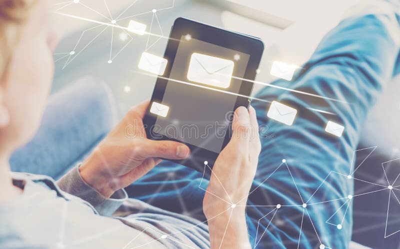 Emails with Man Using a Tablet Stock Image - Image of small, technology ...