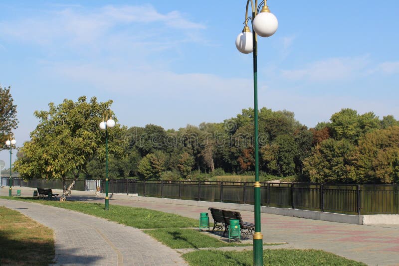 An Embankment Along a River in the City Park Stock Photo - Image of ...