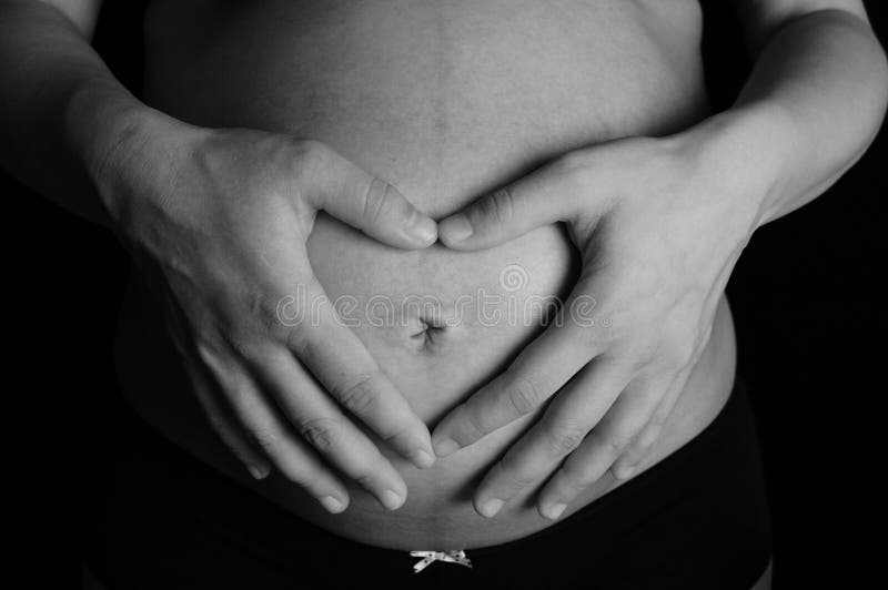 Embarazado imagen de archivo. Imagen de mano, mama, amor - 19510215
