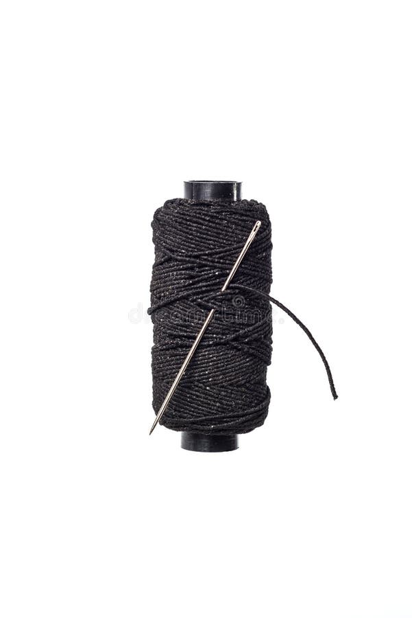 Embedded Needle in a Spool of Sewing Thread Black Stock Image - Image ...