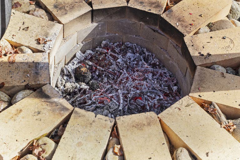 Embers of Fire in Circle of Bricks Stock Photo - Image of burning ...
