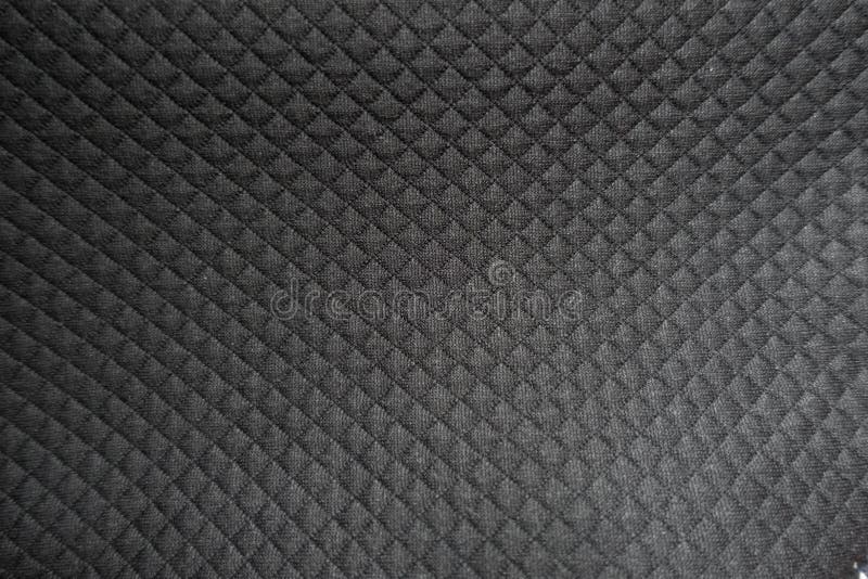 Embossed Pattern on Black Polyester Fabric Stock Image - Image of ...