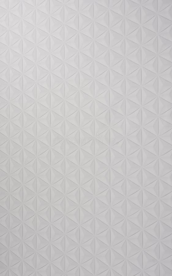 Embossed Triangle Patterns on White Textured Surface Stock Photo ...