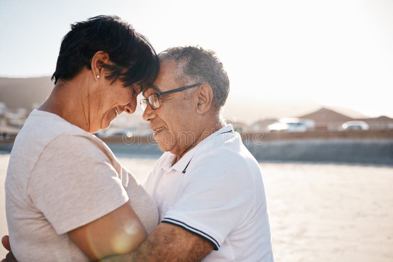 Embrace Love And Senior Couple On Beach For Tropical Holiday Adventure