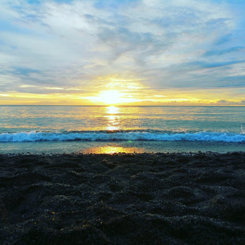 Embrace the sun stock photo. Image of ocean, unedited - 139908220