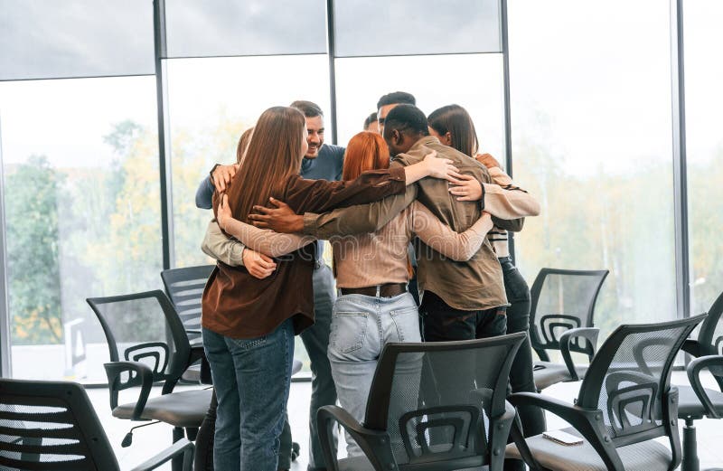 Embracing Each Other. Group of People are Having Therapy Meeting ...