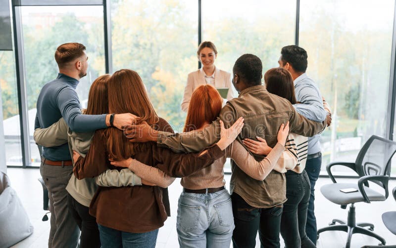 Embracing Each Other. Group of People are Having Therapy Meeting ...