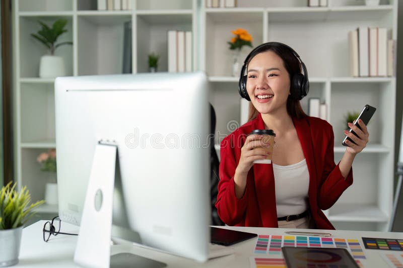 Joyful Design and Relaxation. a Smiling Graphic Designer Enjoys a ...