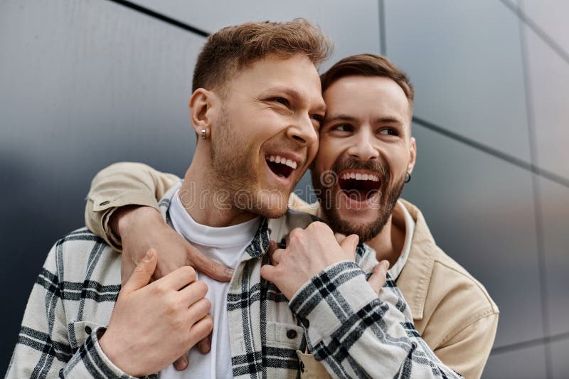 Embracing Joy stock photo. Image of companionship, outdoors - 326149030