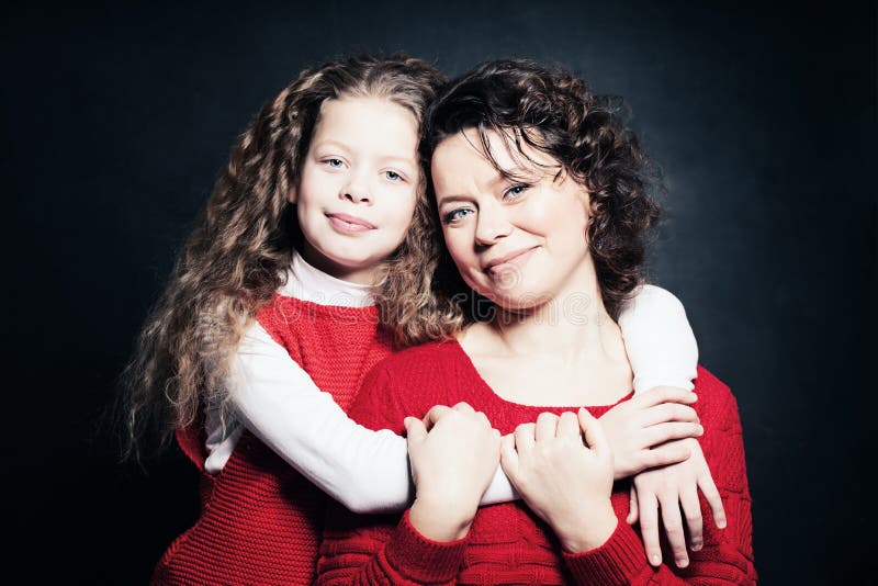 Embracing Mother and Child stock image. Image of attractive - 64727849